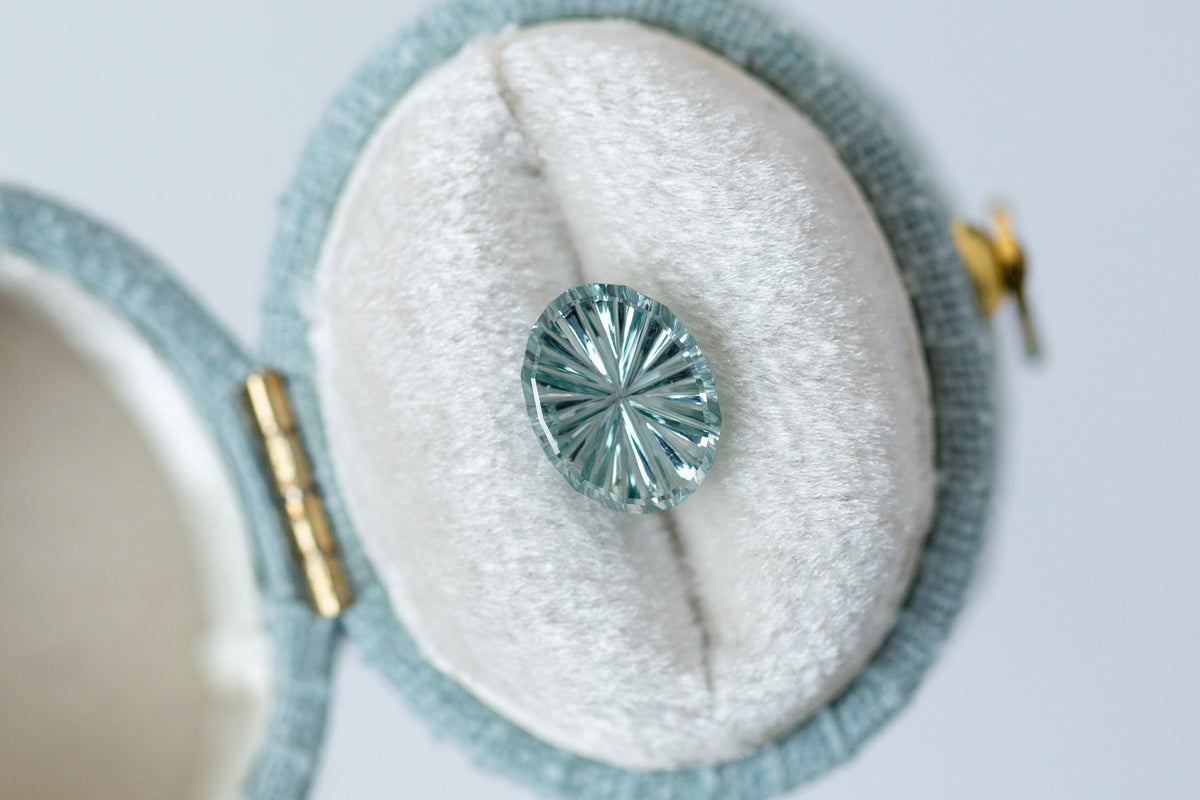 1.79ct Oval Light Blue Green Sapphire, Starbrite cut by John Dyer – Oore jewelry