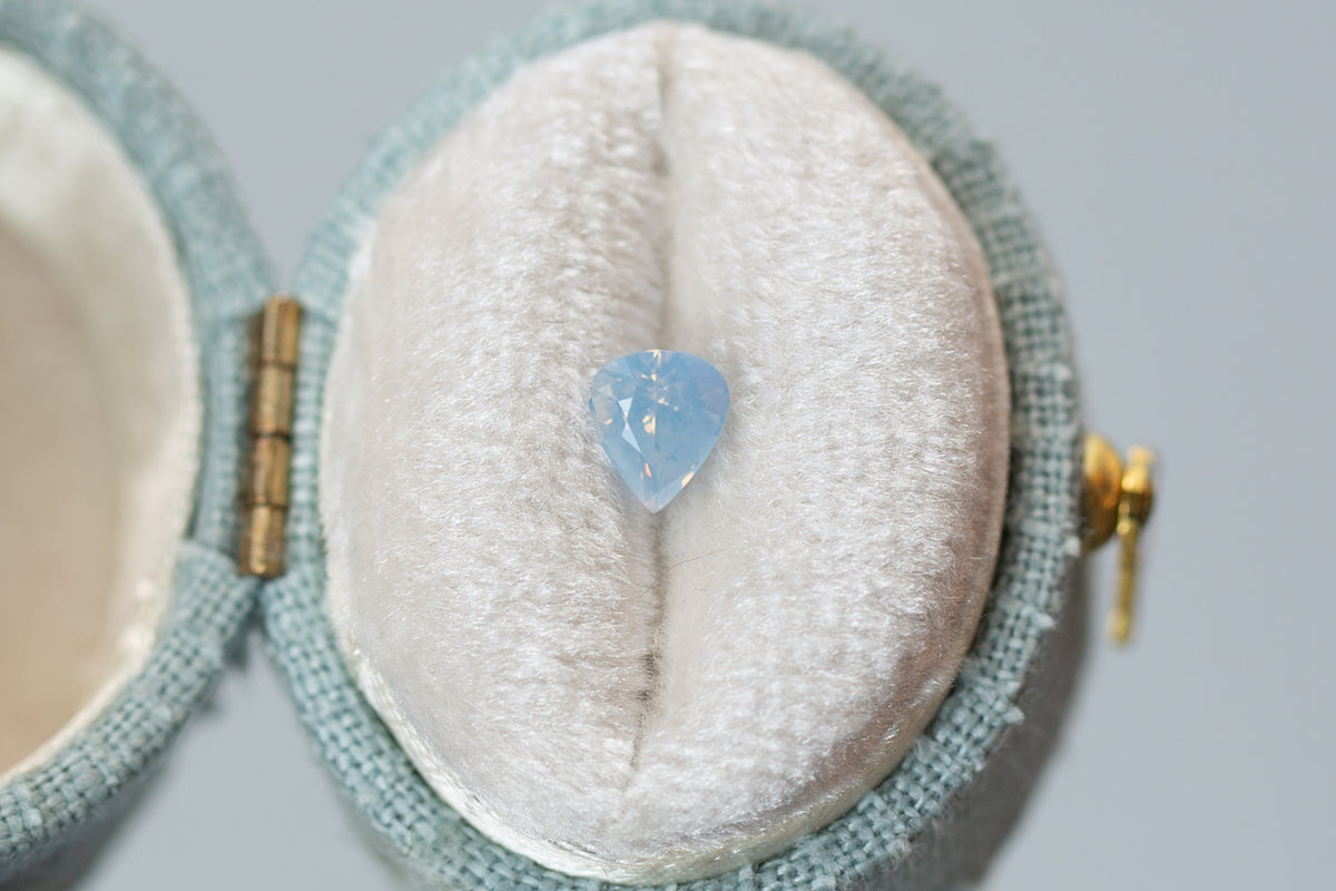 0.65ct Pear Opalescent Light Blue Sapphire – Oore Jewelry