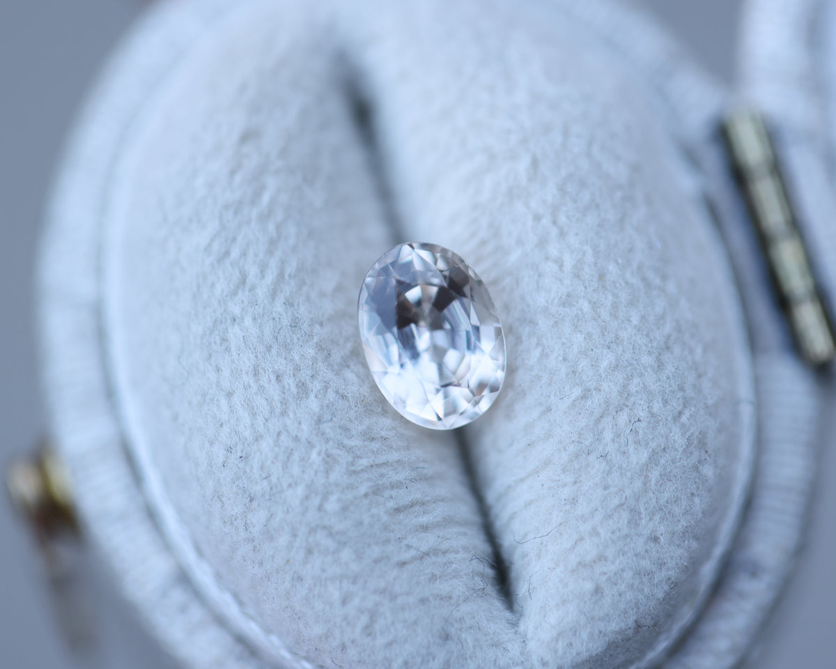 1.16ct oval light peach/white sapphire – Oore Jewelry