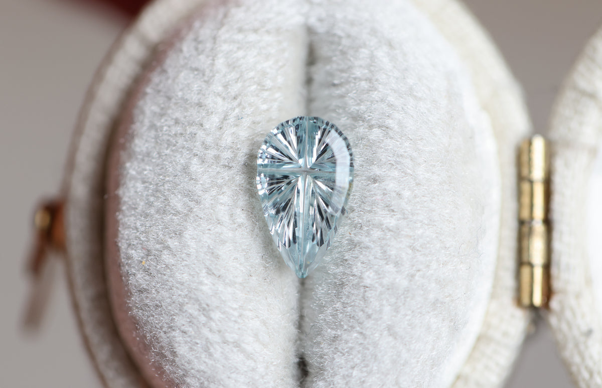 1.25ct pear light blue sapphire, Starbrite cut by John Dyer – Oore Jewelry