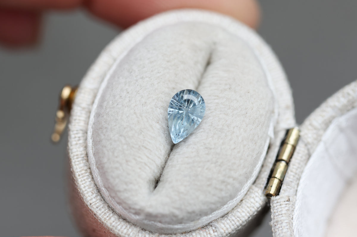 1.05ct pear light blue sapphire, Starbrite cut by John Dyer – Oore Jewelry