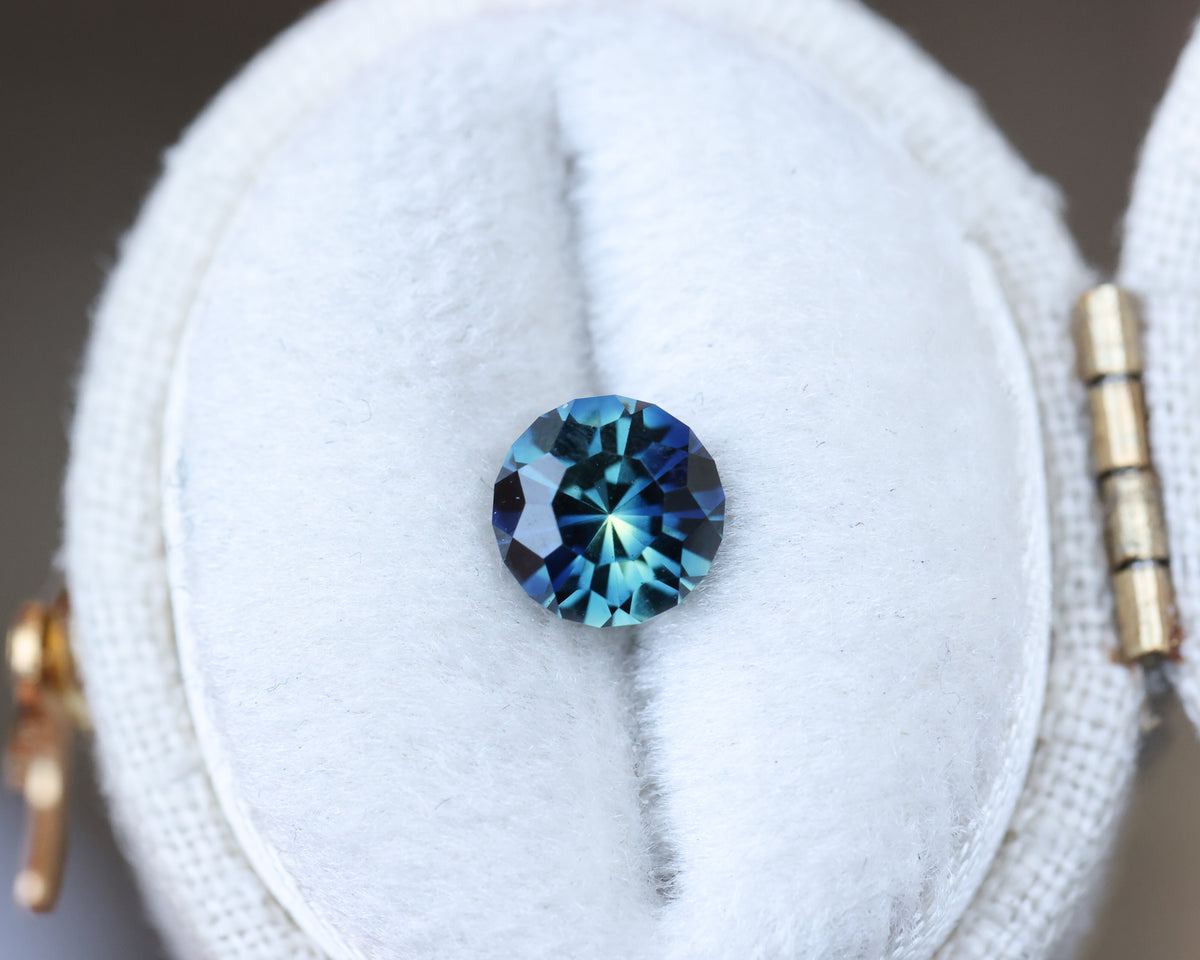 1.21ct round blue teal sapphire, Sunburst cut by John Dyer – Oore Jewelry