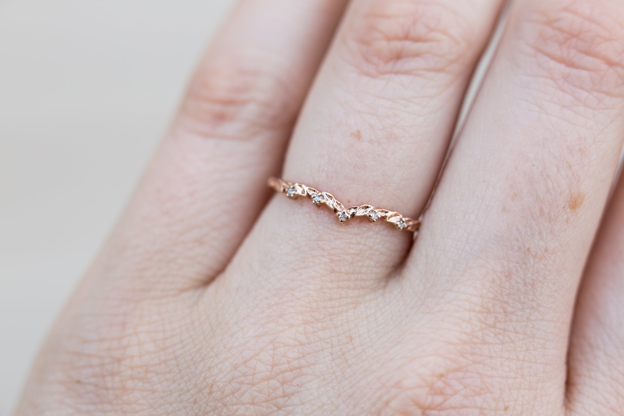 Curved leaf wedding band store